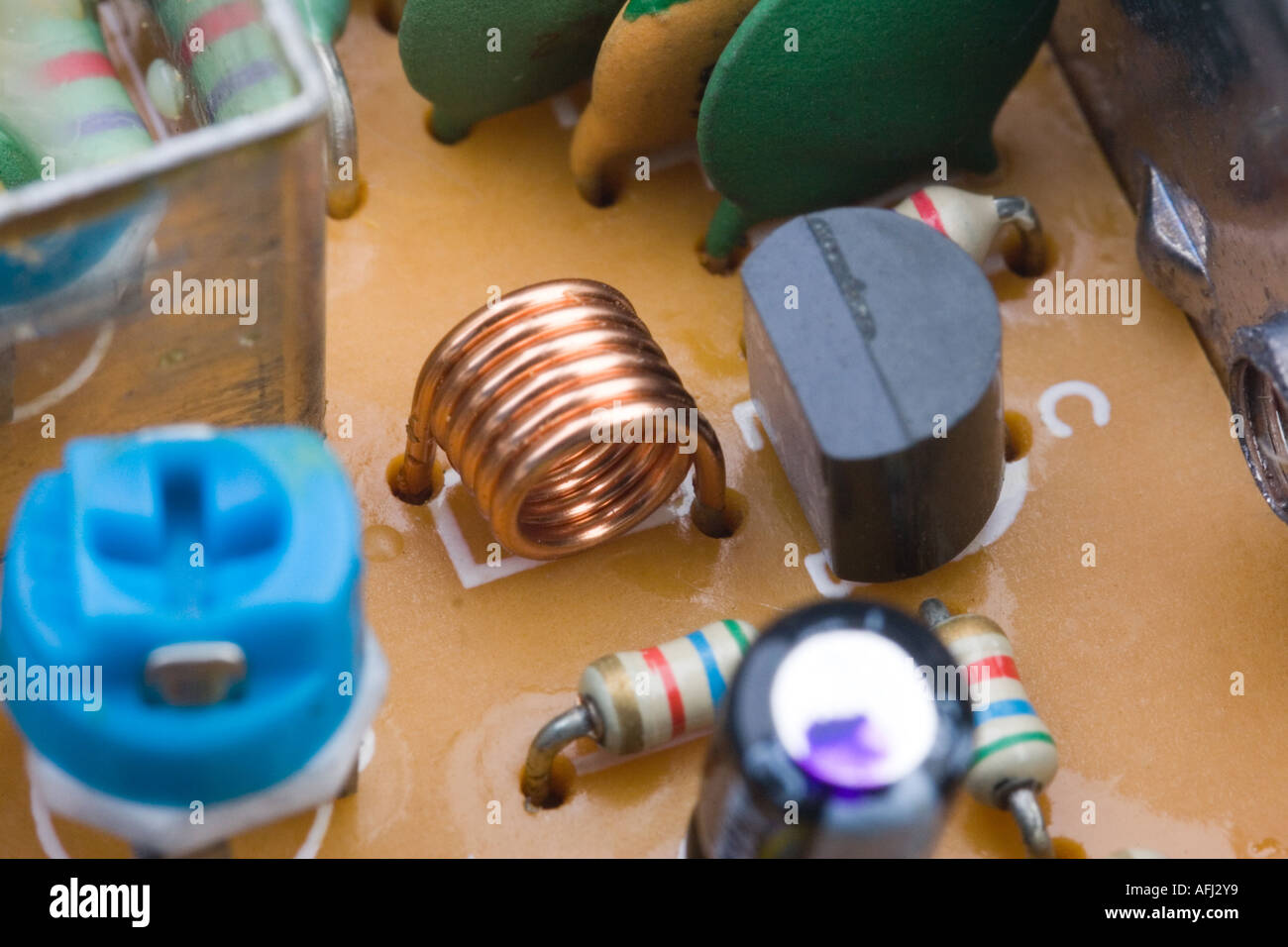 RF coil on circuit board of UHF video modulator Stock Photo - Alamy