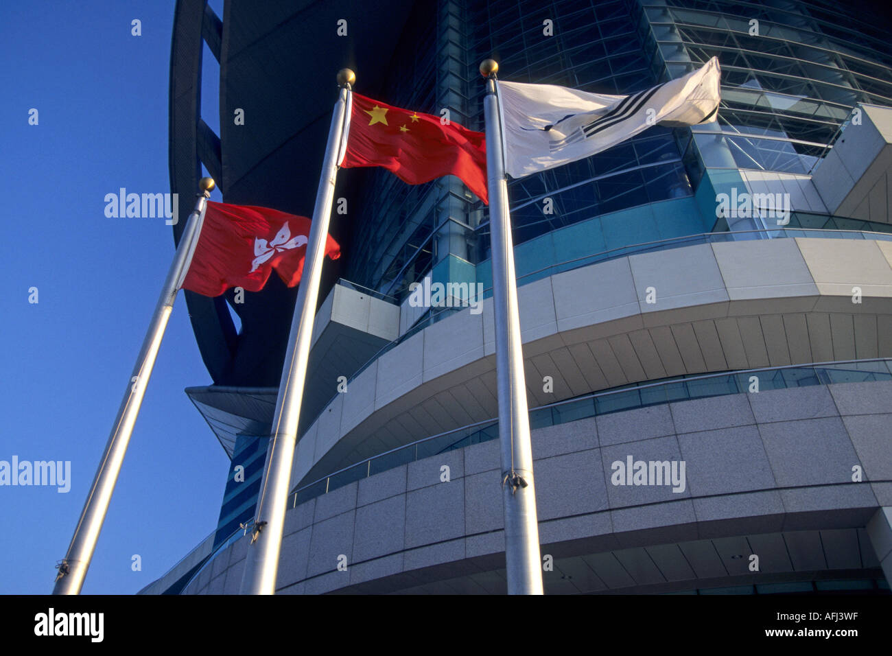 Flags at Hong Kong Convention and Exhibition Centre Stock Photo - Alamy