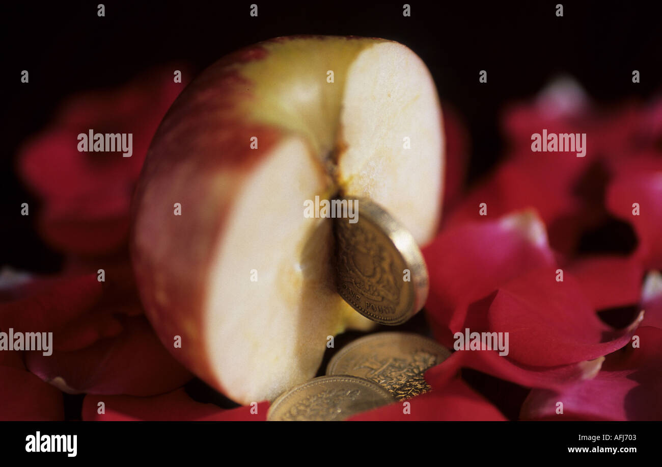Apple Coins and Rose Petals Stock Photo - Alamy