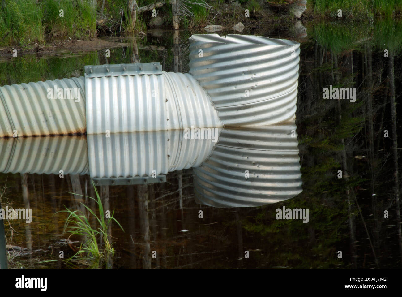 Reflection of drainage pipe Stock Photo - Alamy