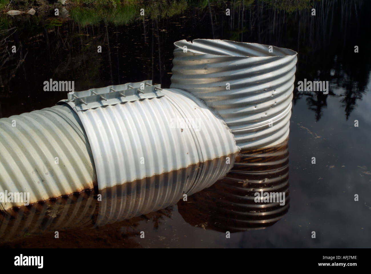Reflection of drainage pipe Stock Photo - Alamy