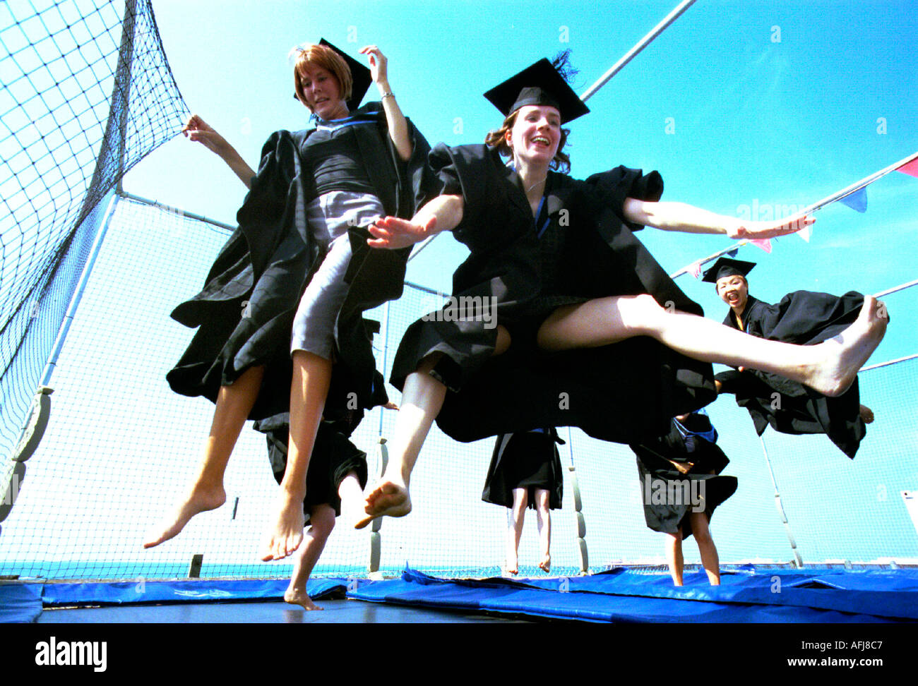 Happy university students hi-res stock photography and images - Alamy