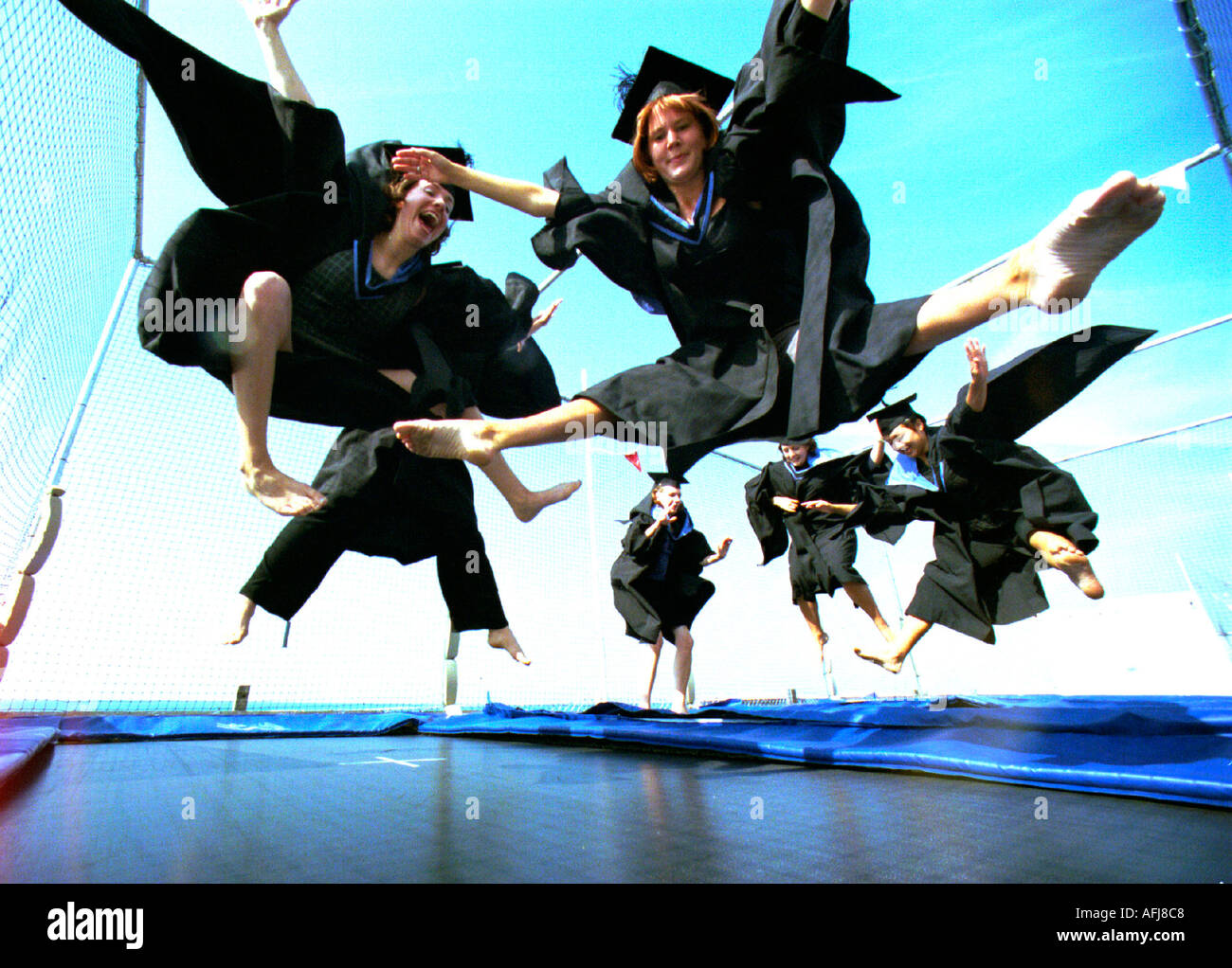 Graduates jump hi-res stock photography and images - Alamy