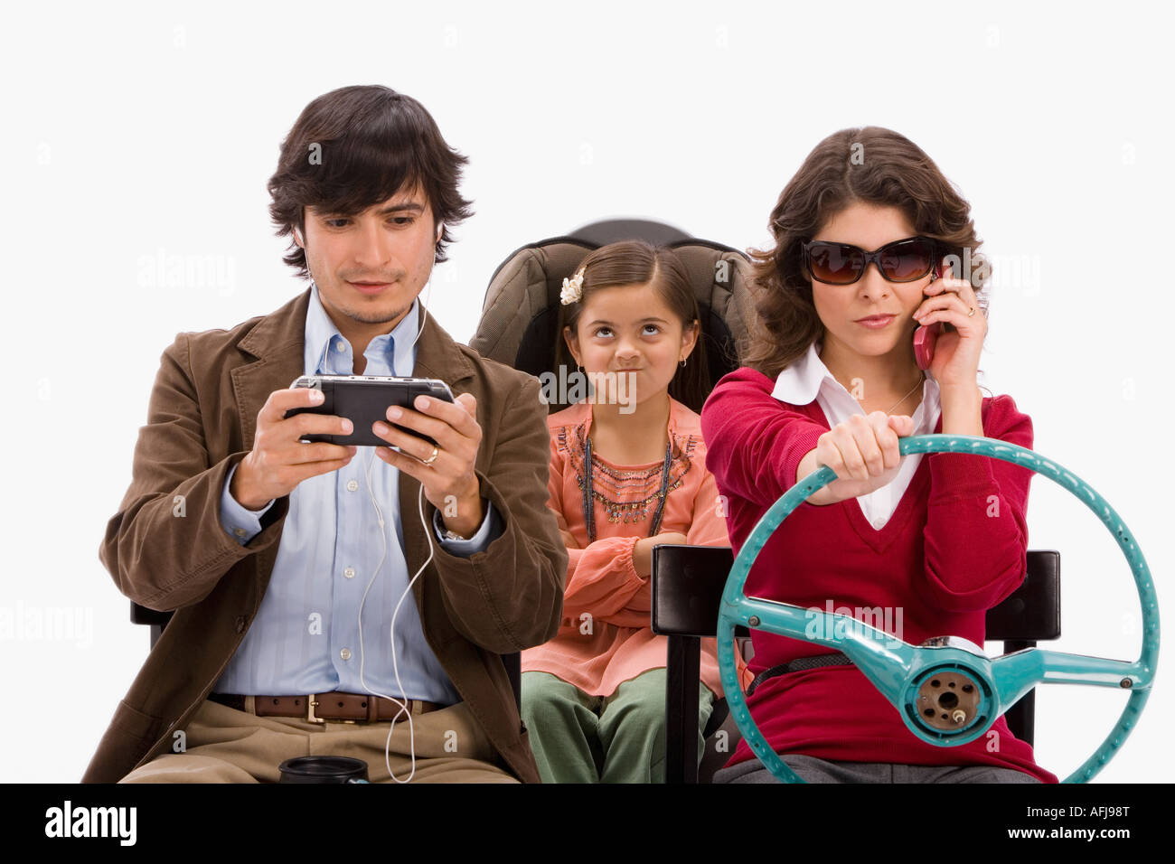 Distracted family in imaginary car Stock Photo - Alamy