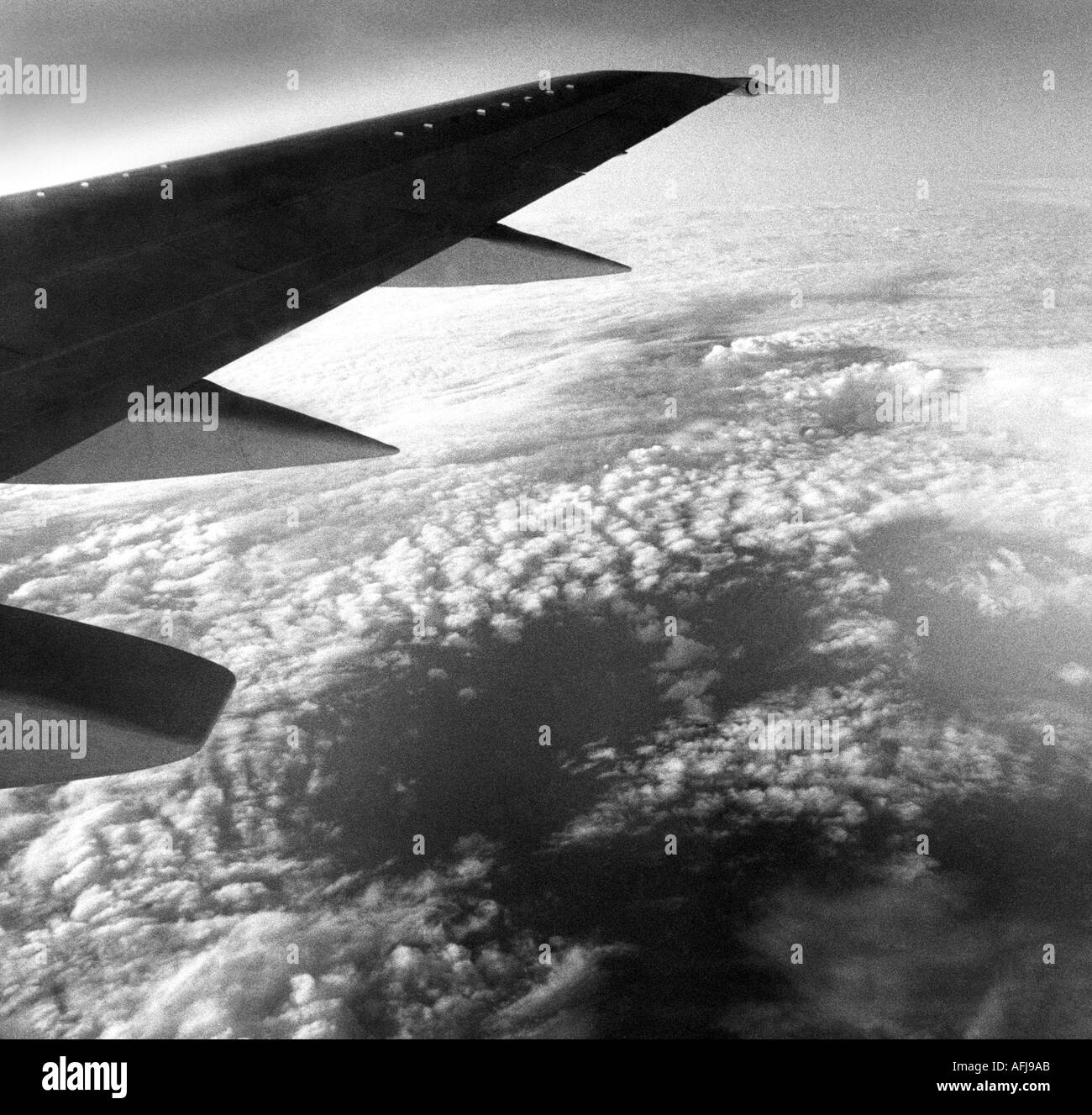 Plane wing in sky Stock Photo - Alamy