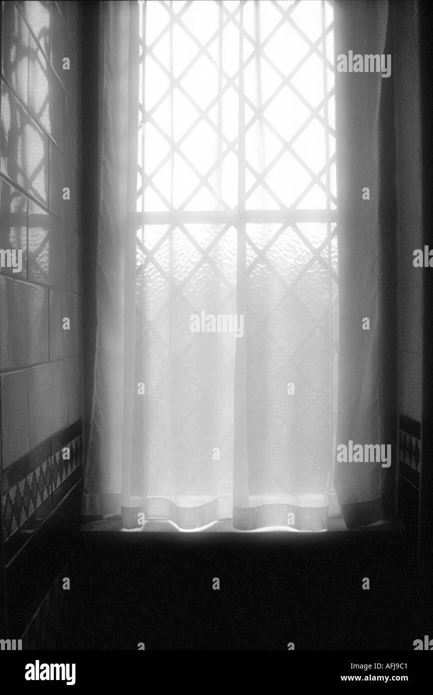 Curtain on window inside house Stock Photo - Alamy