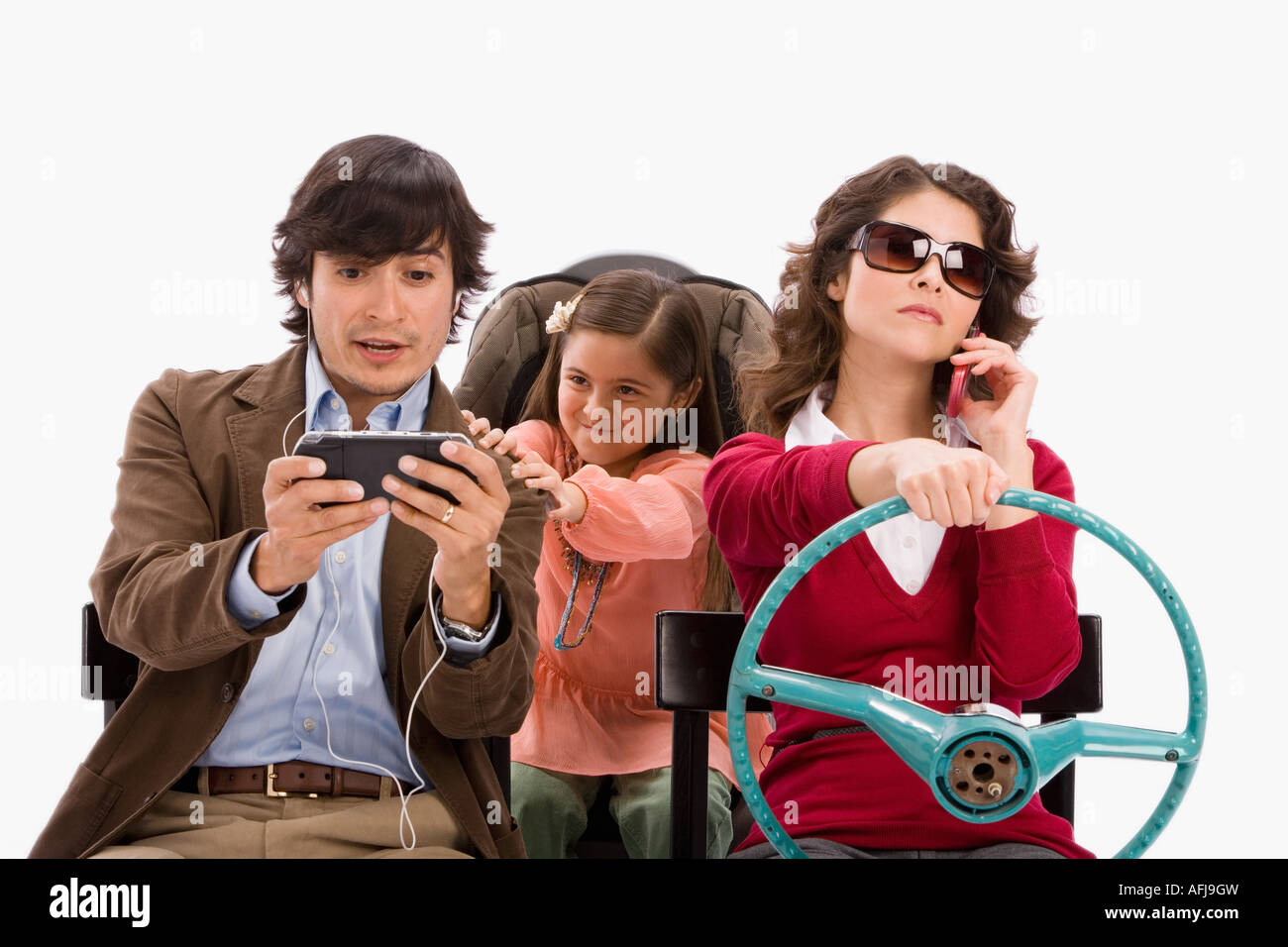 Distracted family in imaginary car Stock Photo - Alamy