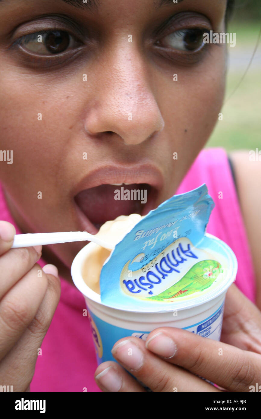 Women Eating Ambrosia Cream Rice Stock Photo - Alamy