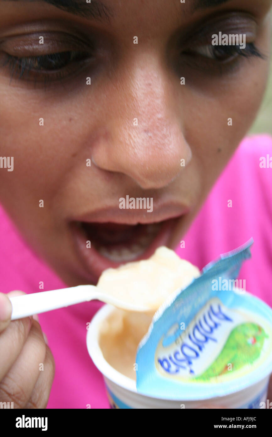 Women Eating Ambrosia Cream Rice Stock Photo - Alamy