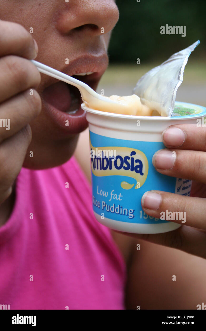 Women Eating Ambrosia Cream Rice Stock Photo - Alamy