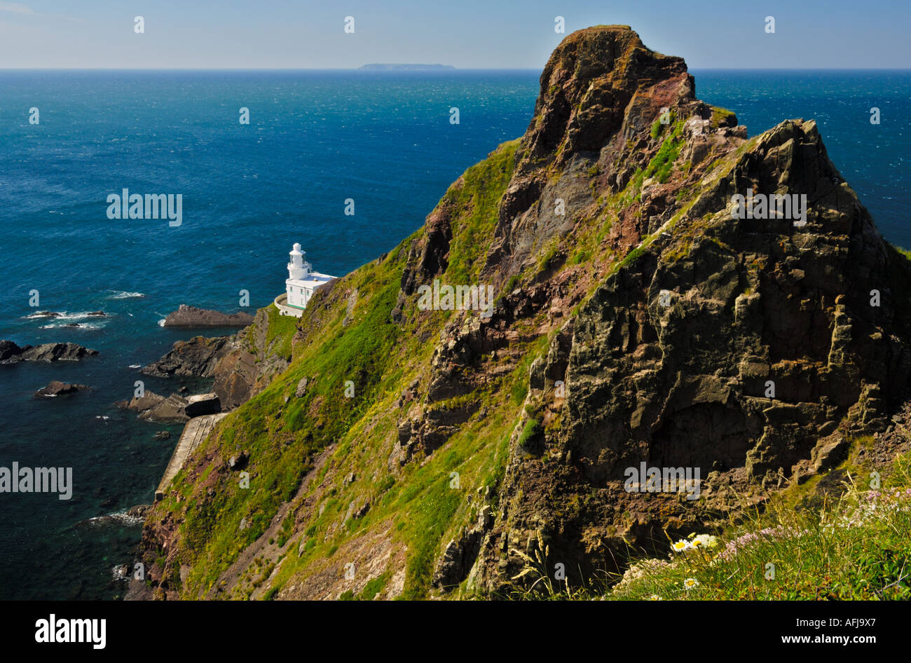 Hartland Point Lighthouse on the North Devon Coast with Lundy Island on ...