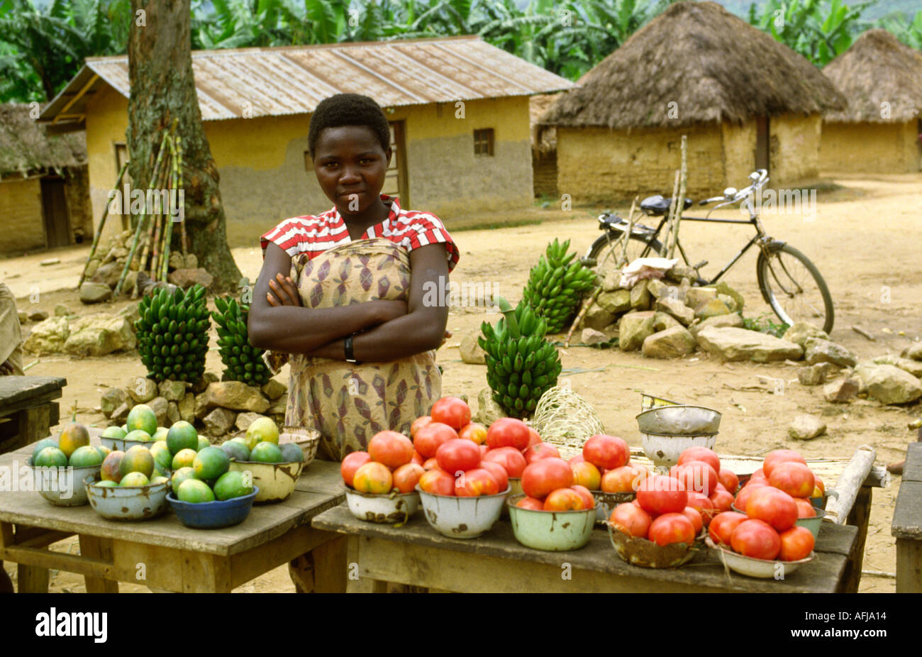 Girl selling local produce in village market near Buta Zaire Africa ...