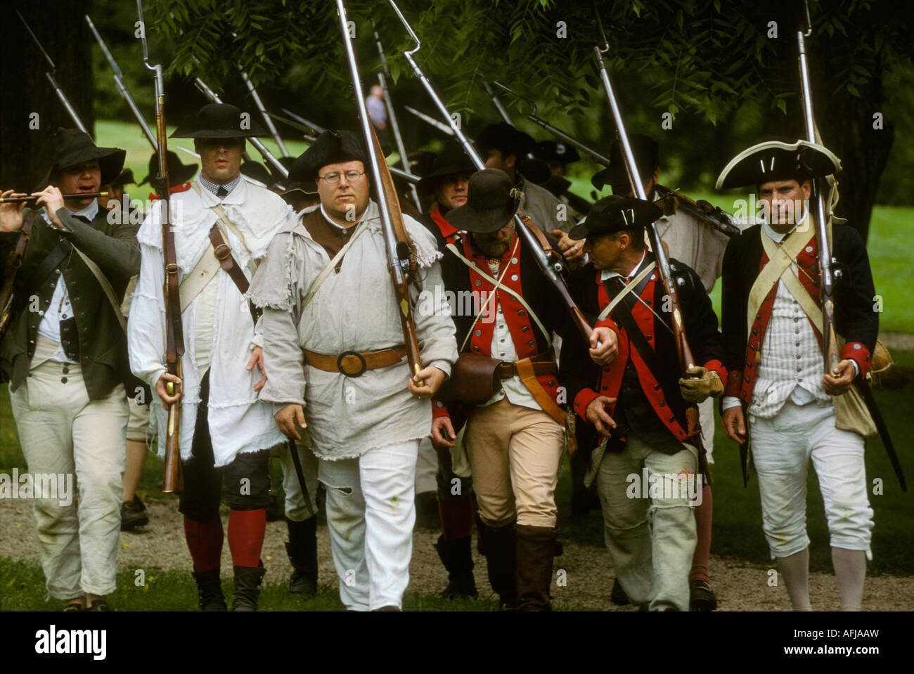 American revolutionary war reenactors prepare for mock combat at Edward ...