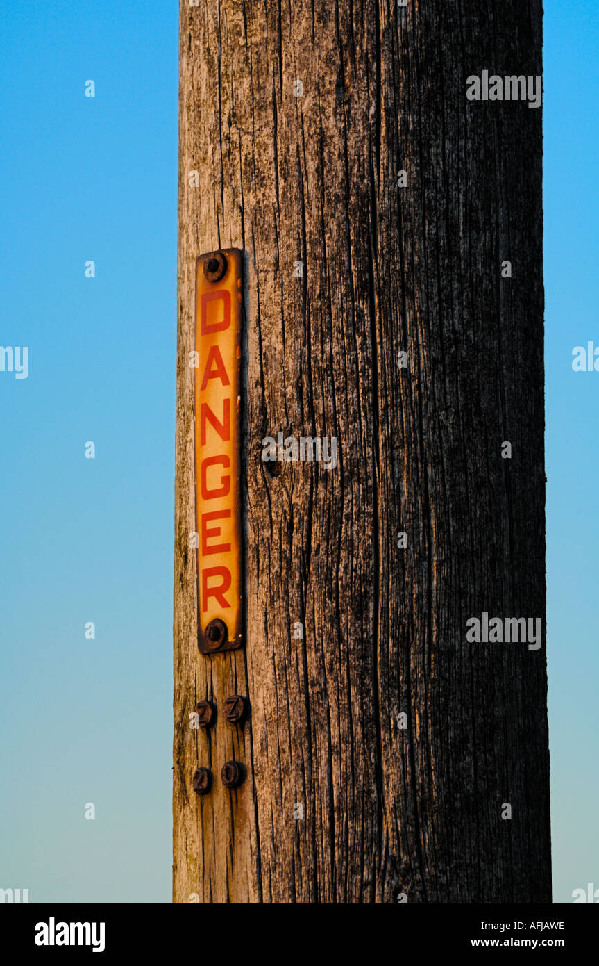 Warning sign on electricity pylon hi-res stock photography and images ...