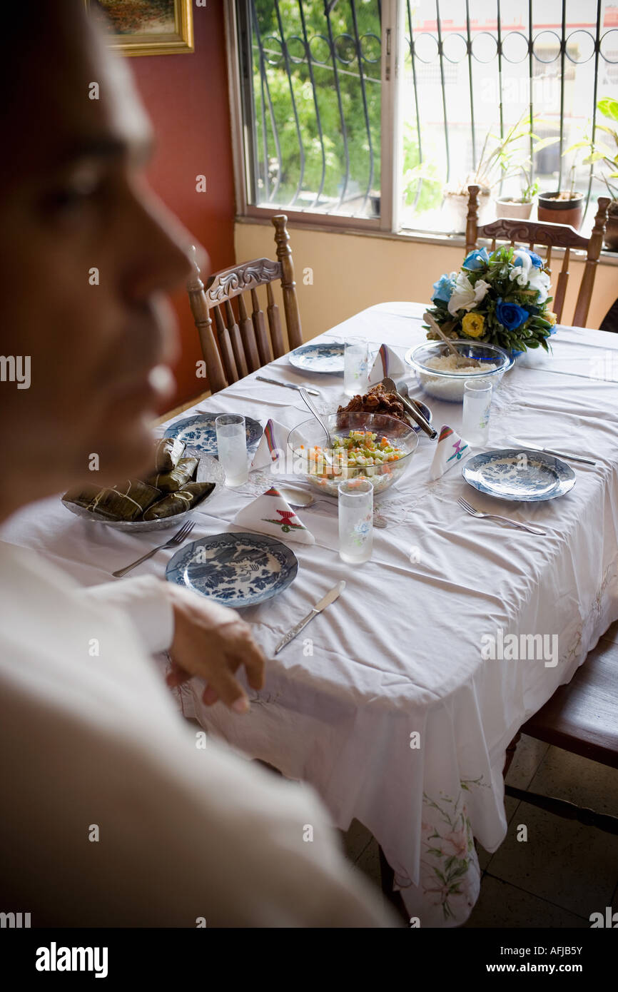 Mature man sitting at the dining table Stock Photo - Alamy