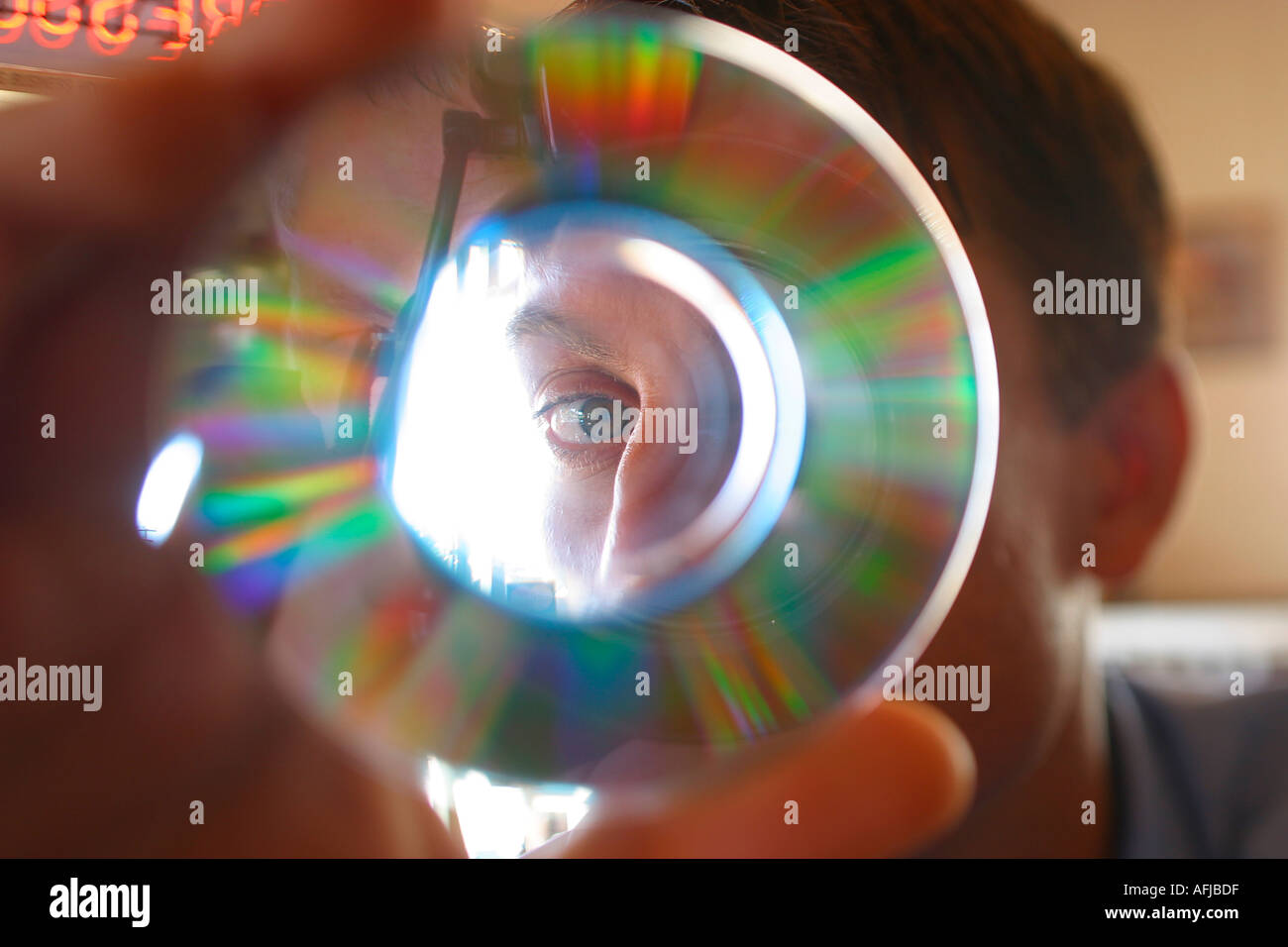 Man peering at computer hi-res stock photography and images - Alamy