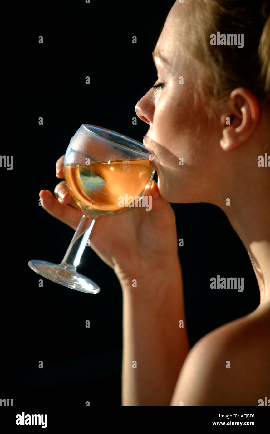 Profile of woman drinking wine hi-res stock photography and images - Alamy