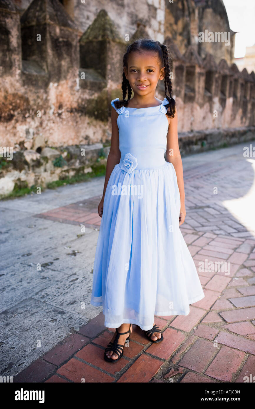 Portrait of a girl standing and smiling Stock Photo - Alamy