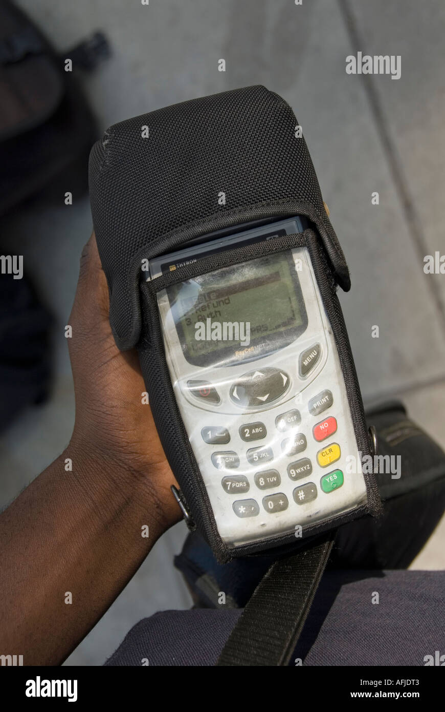 Portable credit debit card scan machine used by tour bus operators to ...