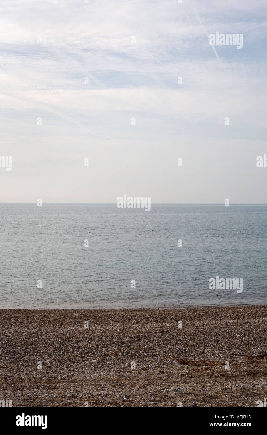 Cold grey seascape at Pagham West Sussex on the South coast of England ...