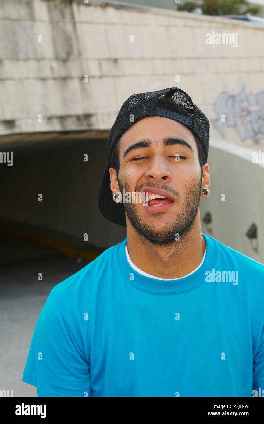 Young man making faces Stock Photo - Alamy