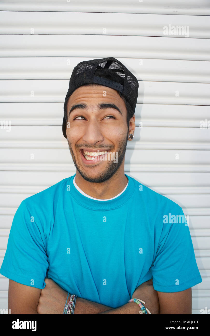 Young man making faces Stock Photo - Alamy