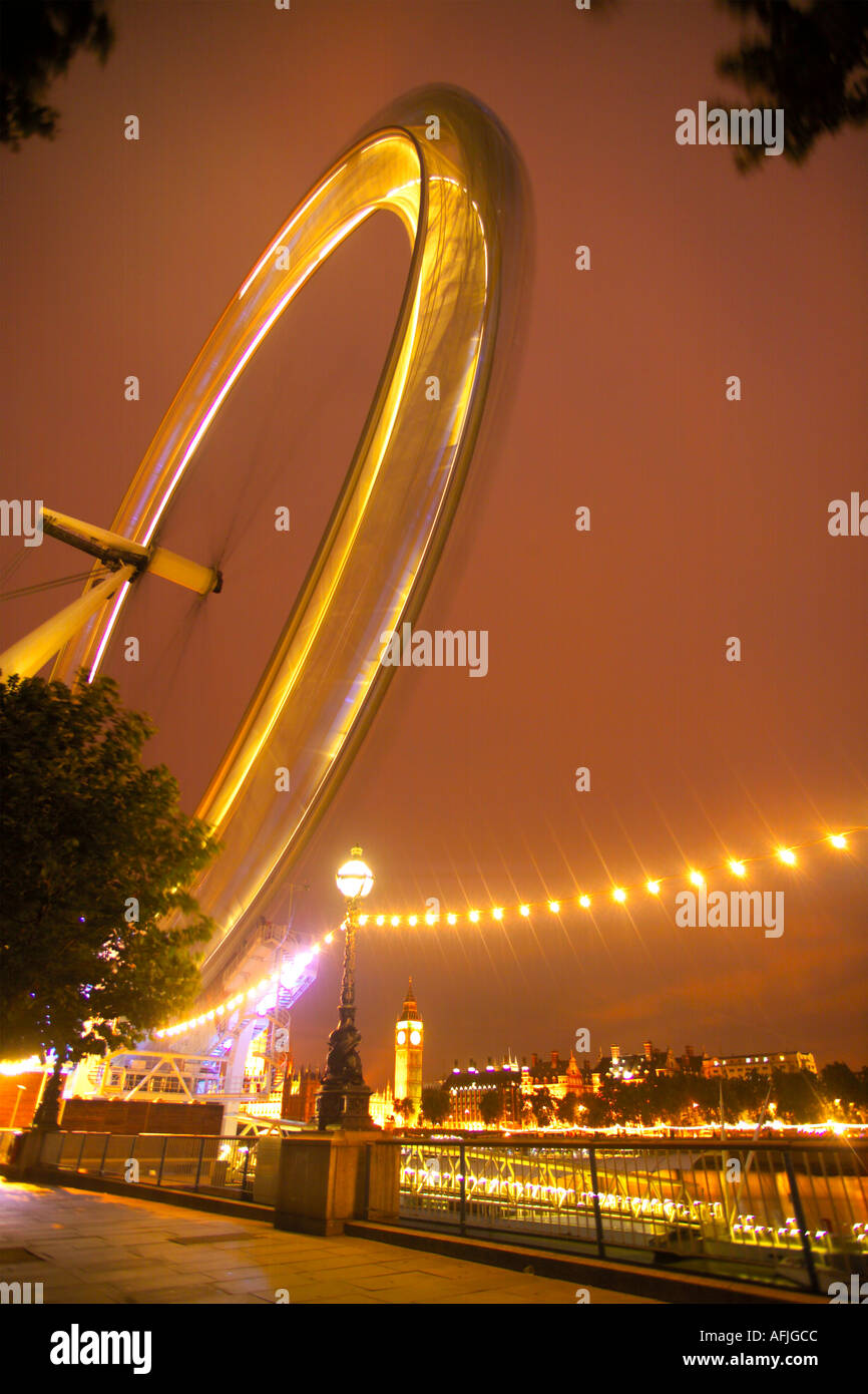 London eye at night River Thames big ben Westminster bridge Houses of ...
