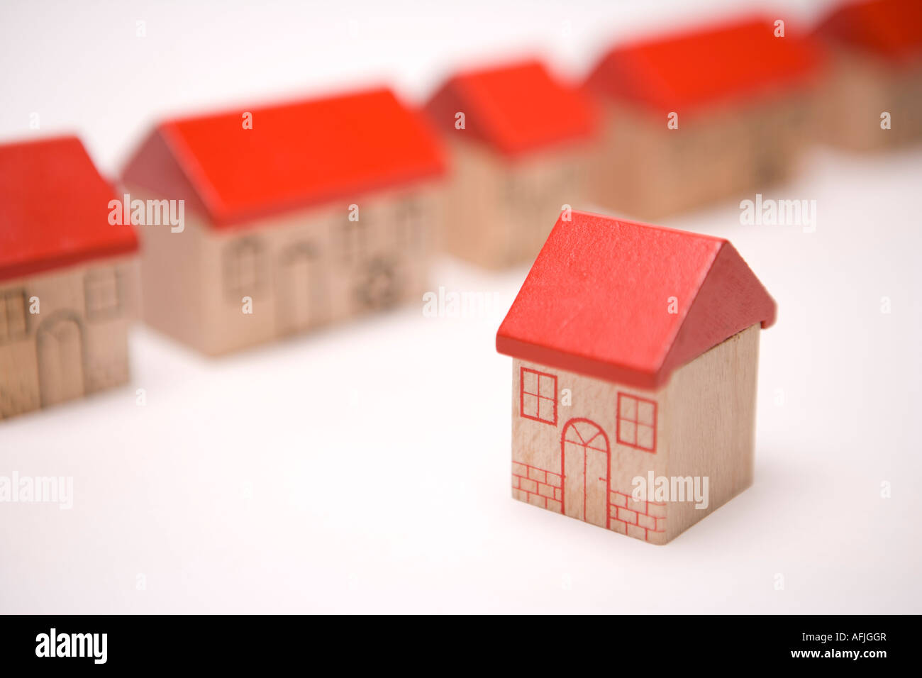 Housing row of houses with single property standing out all on its own ...