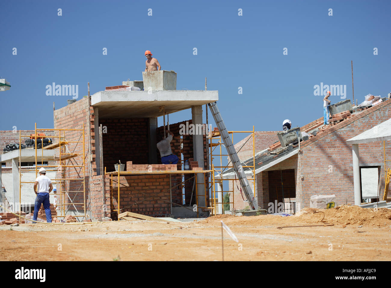 construction site of brick and concrete buildings Stock Photo - Alamy