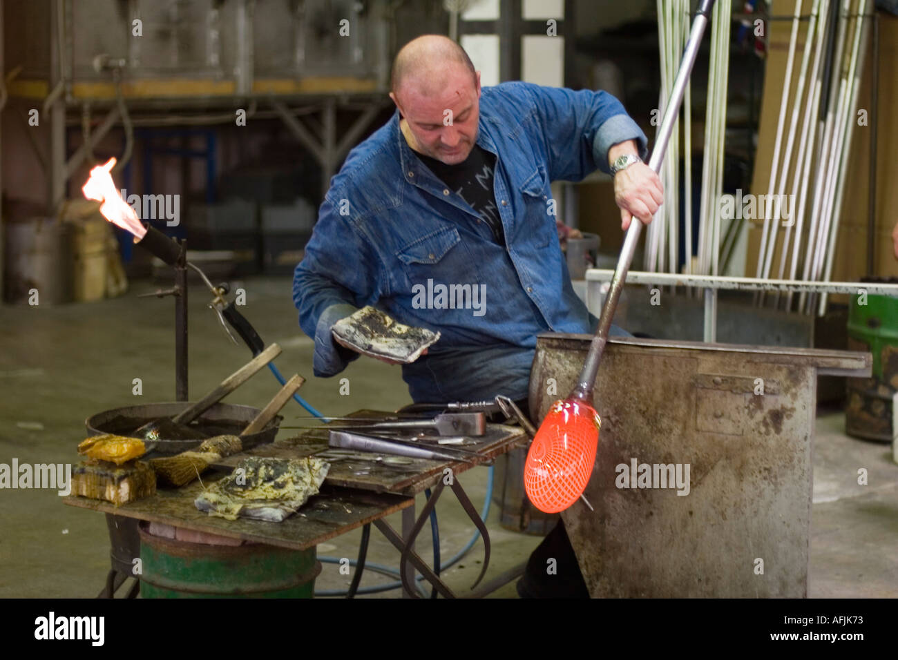 Glass making in a glass factory on the Island of Murano near Venice ...