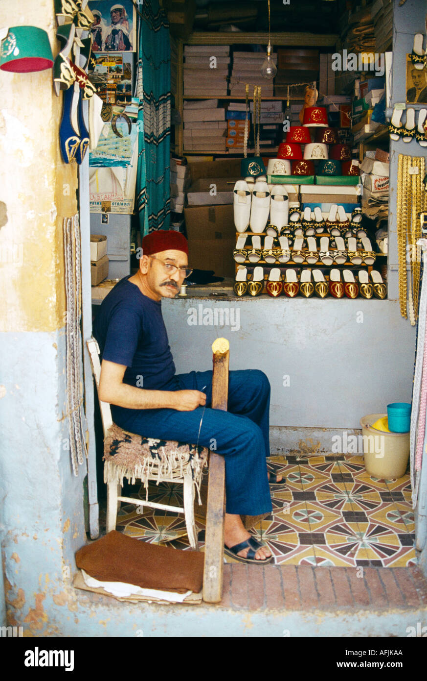 Man selling hats hi-res stock photography and images - Alamy