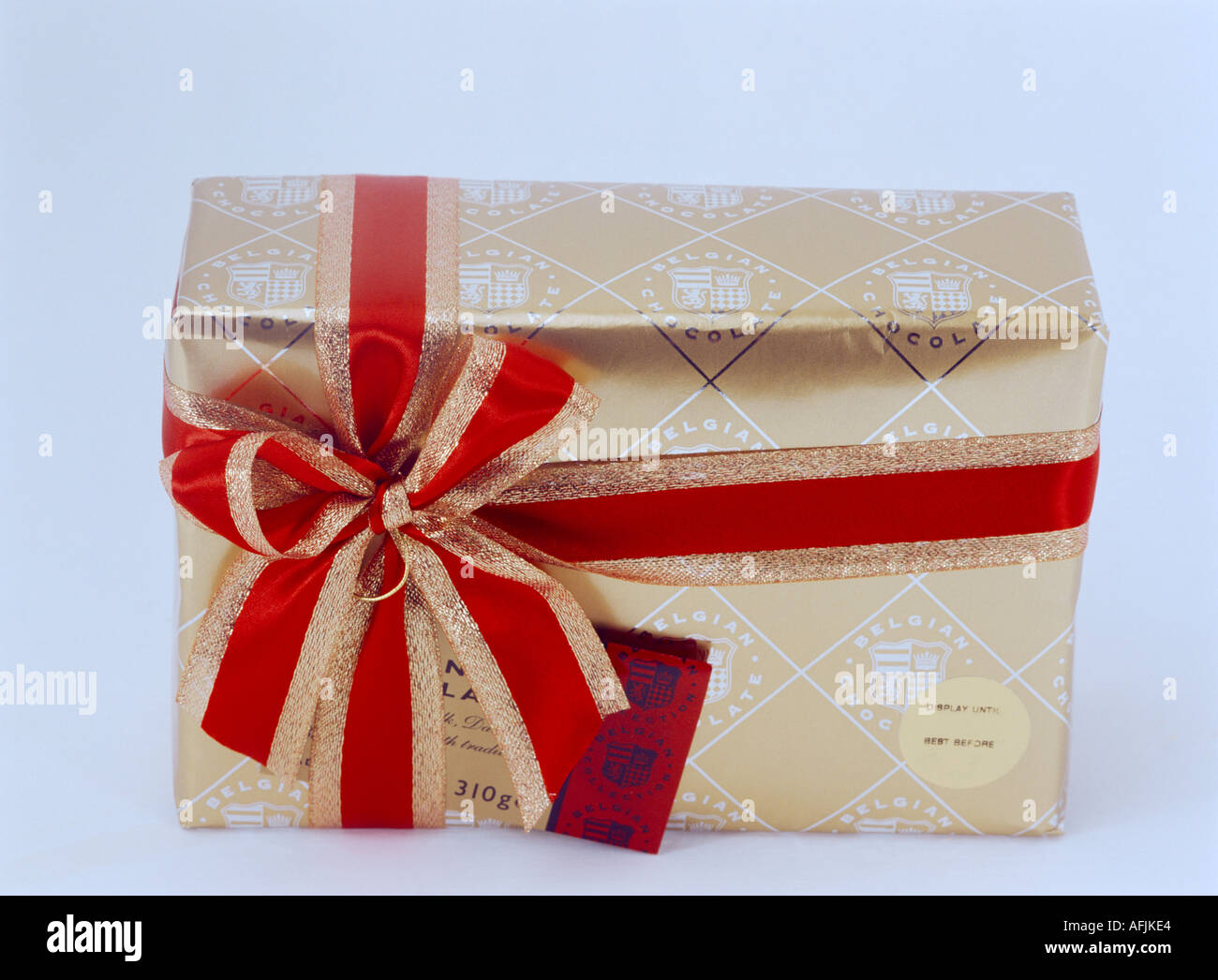 Box Of Chocolates Wrapped Up Present Stock Photo - Alamy