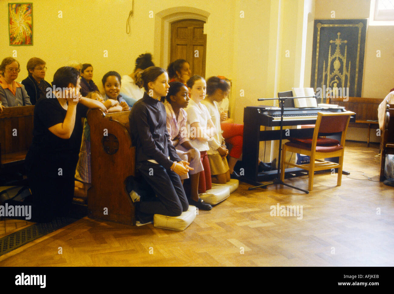 Children praying church hi-res stock photography and images - Alamy