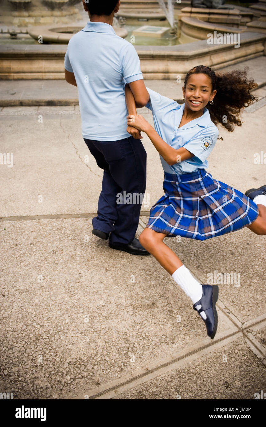 School children dancing salsa in center plaza Stock Photo - Alamy