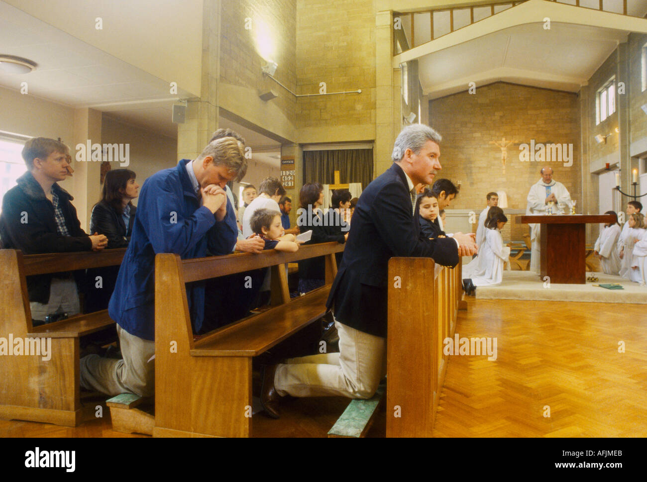 First Communion People Praying At St Bernard Church Catholic Stock ...