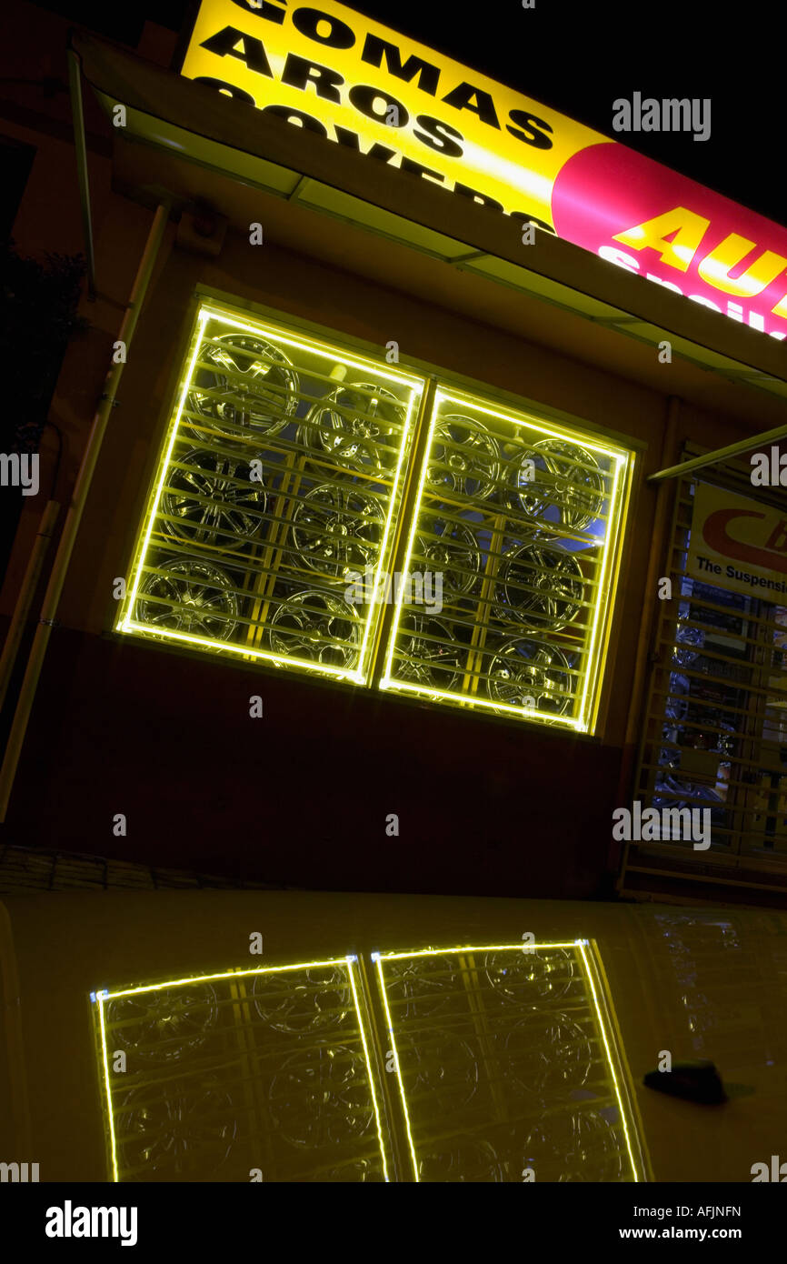 Car rims in shop window Stock Photo - Alamy
