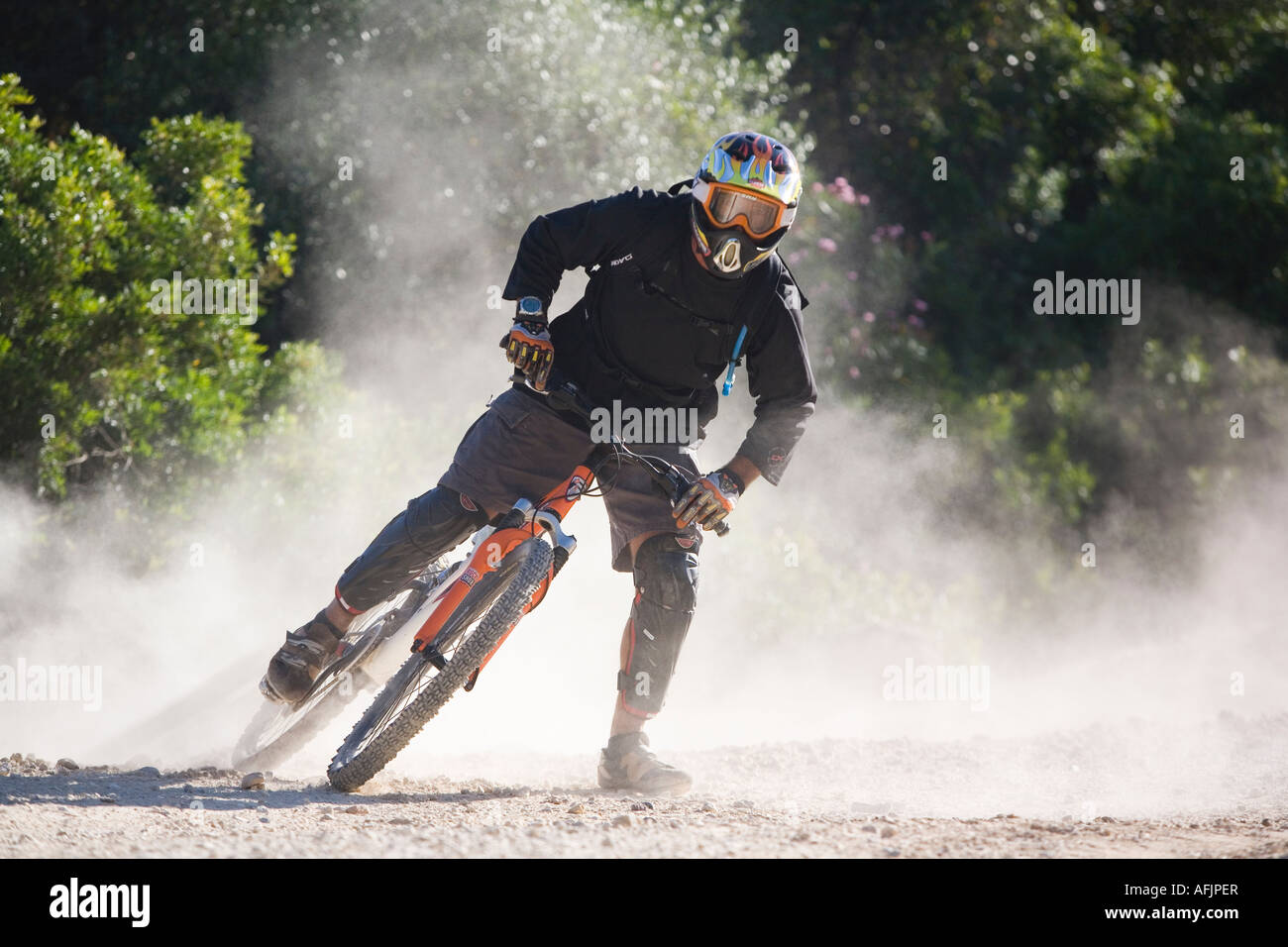 Extreme Mountain Biker Skidding his bike Stock Photo - Alamy