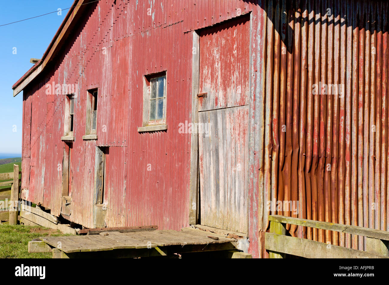 An old, rusty, corrugated iron, covered farm building Stock Photo - Alamy