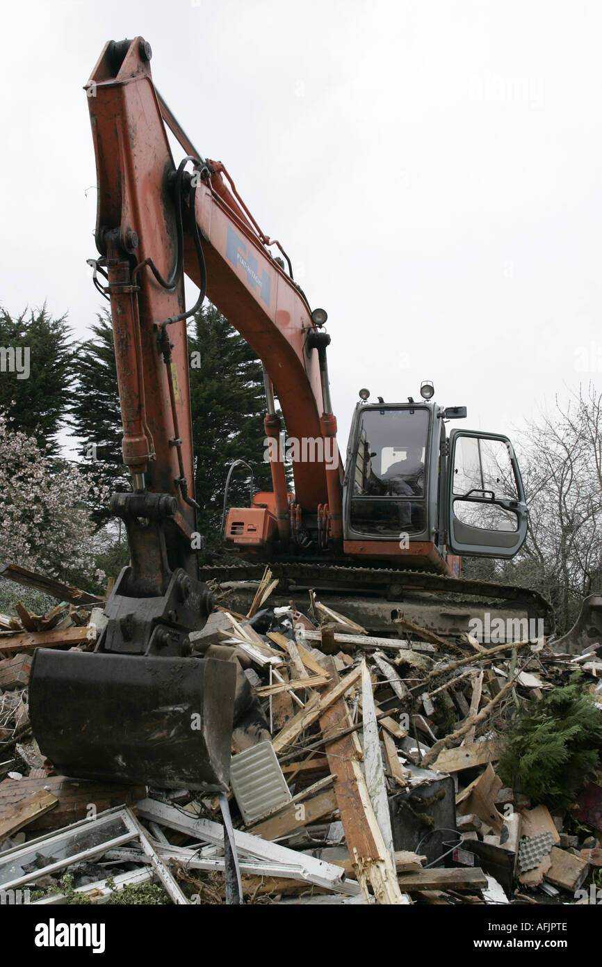 empty orange fiat hitachi JCB with cab door open on construction site ...