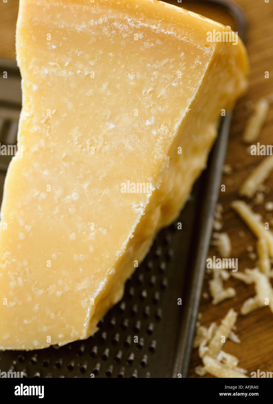Parmesan cheese and grater Stock Photo - Alamy