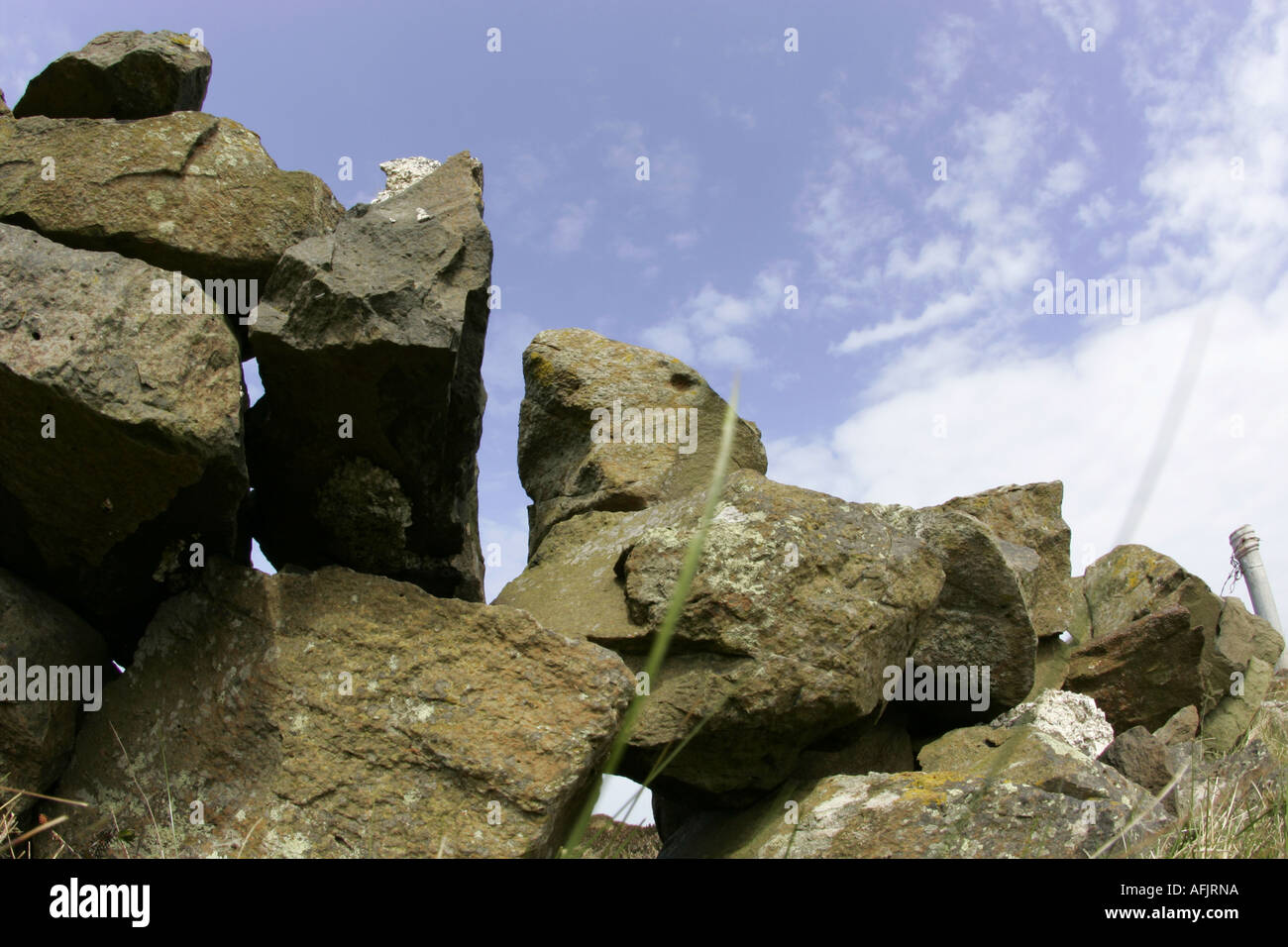 traditional irish dry stone wall basalt stones and blue sky rathlin ...