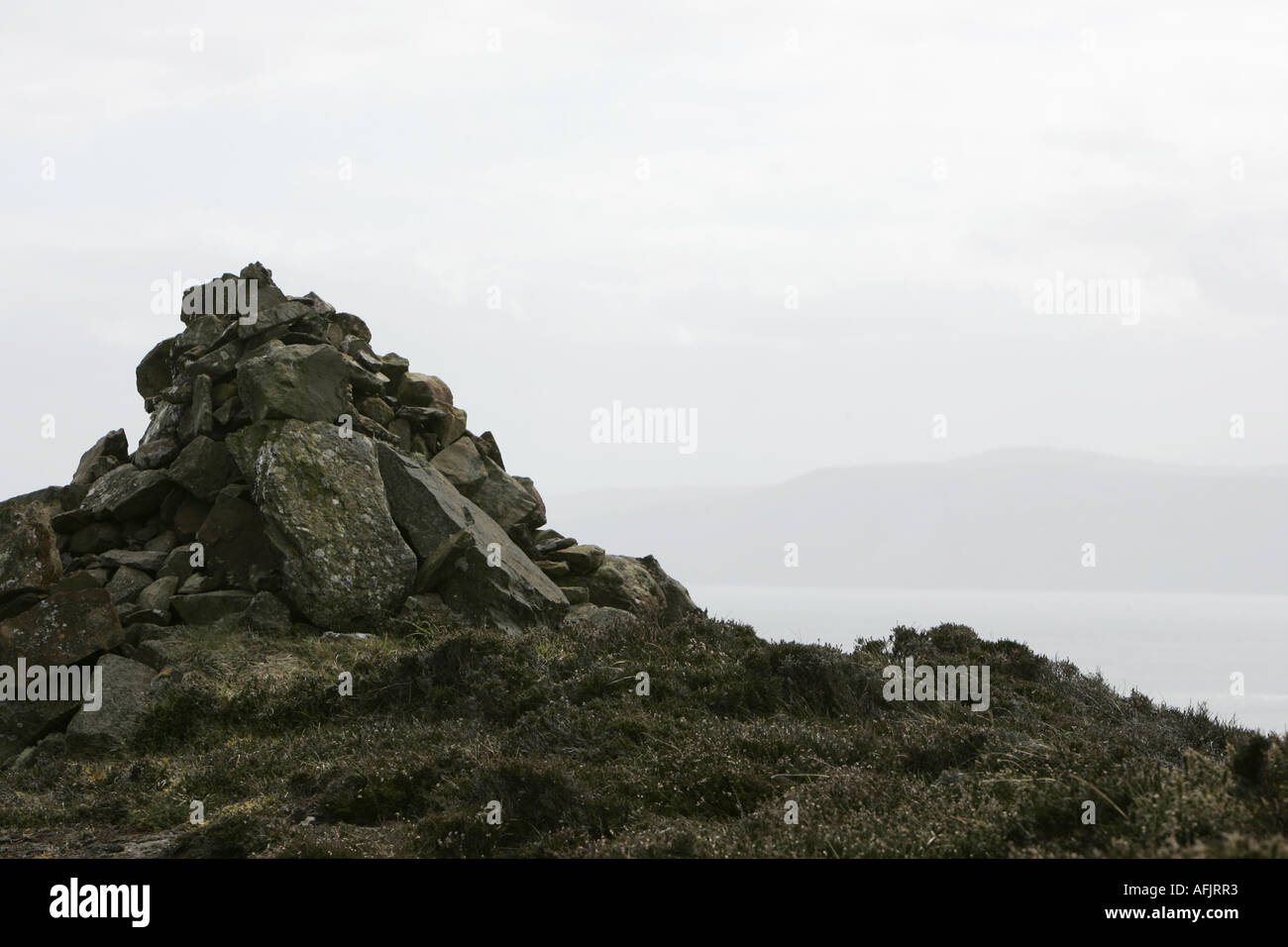 traditional irish stone cairn basalt stones on rathlin island looking ...