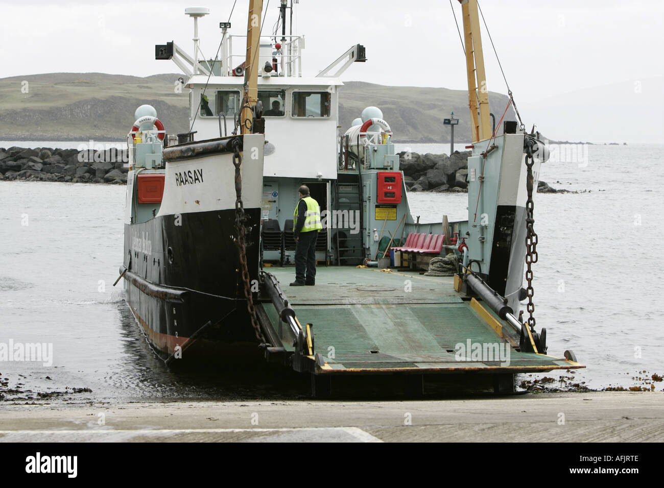Caledonian MacBrayne MV Raasay ferry with vehicle boarding ramp lowered ...