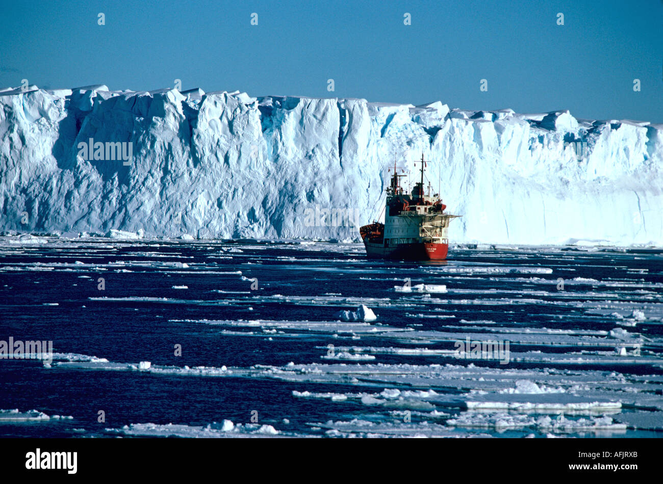ICEBERG AND ICEBREAKER ANTARCTIC Stock Photo - Alamy
