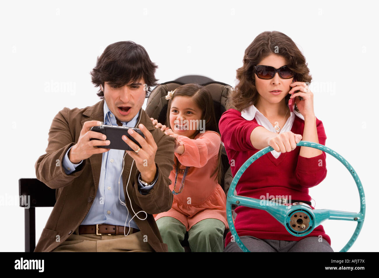 Distracted family in imaginary car Stock Photo - Alamy