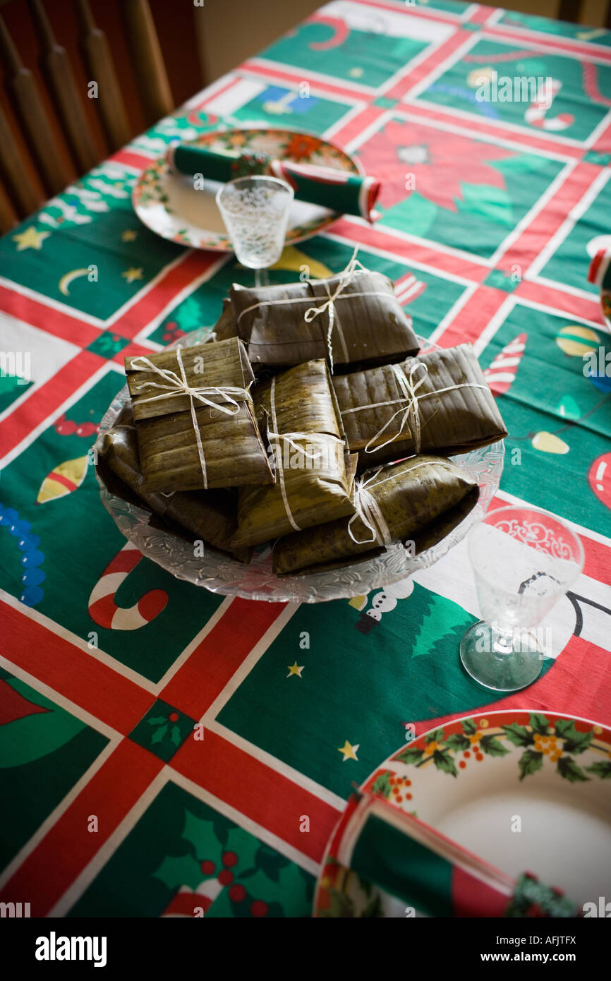 Pasteles wrapped in banana leaves on a plate Stock Photo - Alamy