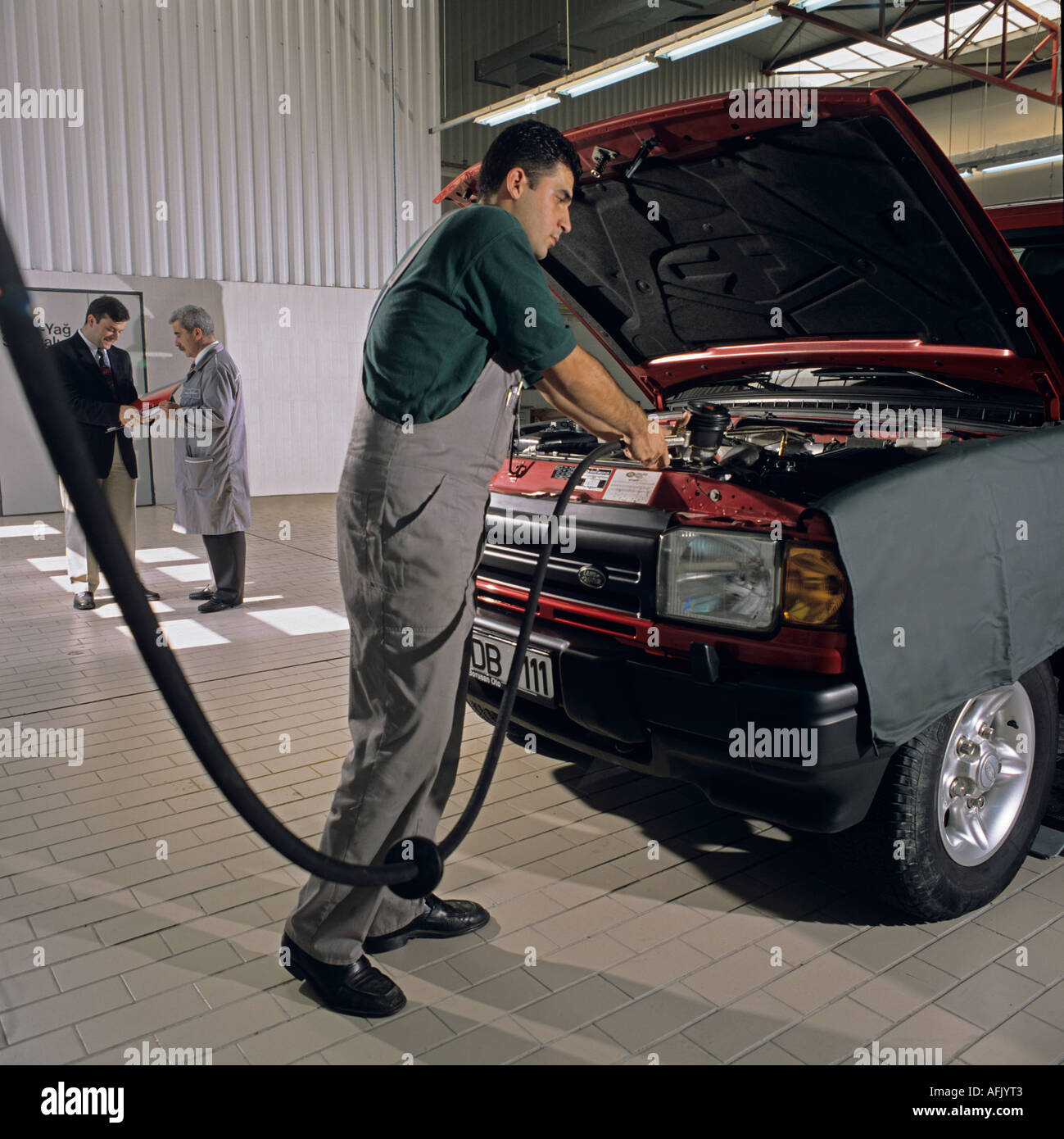 Men servicing hi-res stock photography and images - Alamy