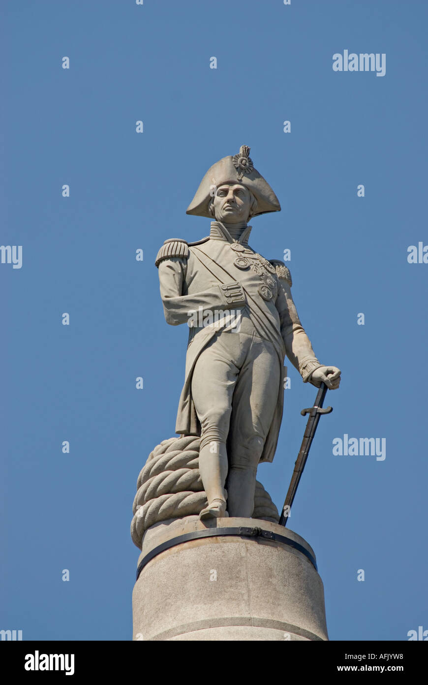 Statue of Admiral Nelson at the top of Nelsons Column Clear blue sky ...