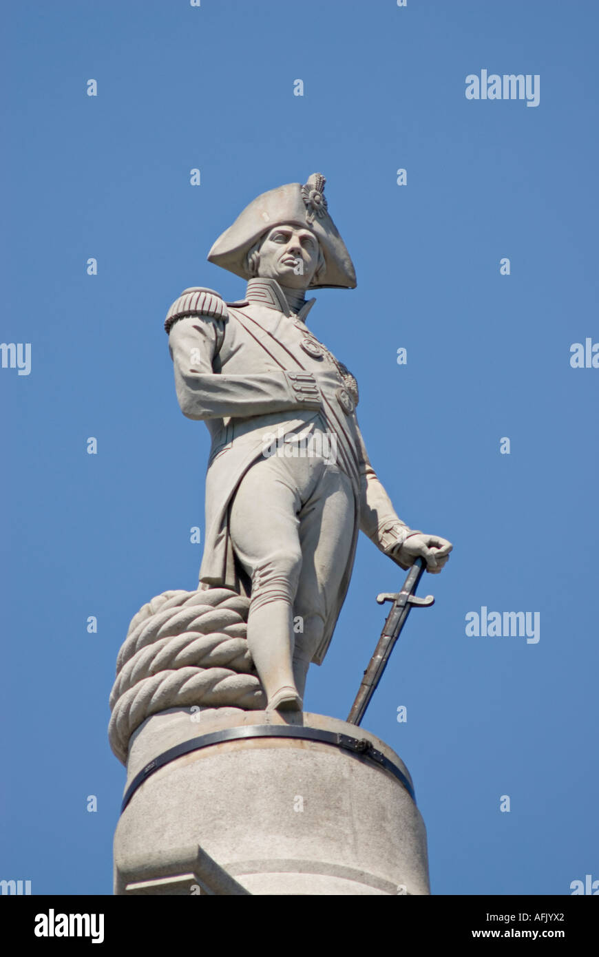 Statue of Admiral Nelson at the top of Nelsons Column Clear blue sky ...