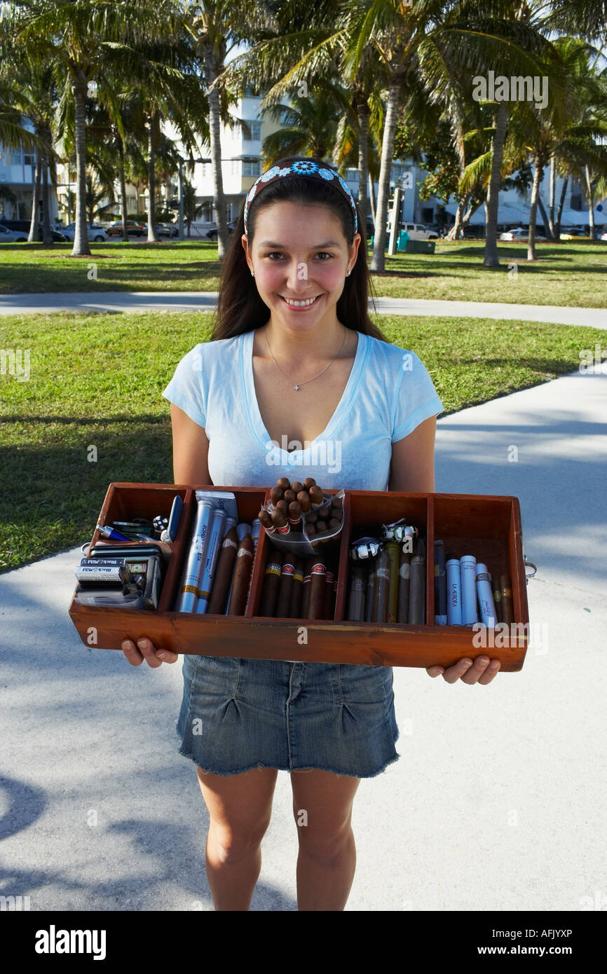 Woman selling cigars at beach Stock Photo - Alamy